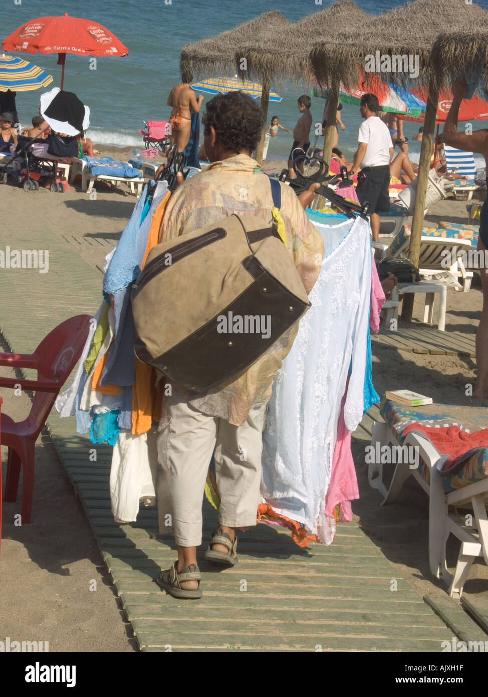 Lookie Lookie man on the beach, Fuengirola, Costa del Sol, Spain Stock ...
