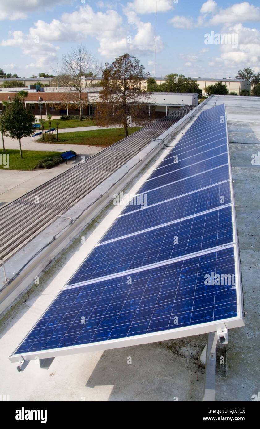 Solar Panels saving electricity by getting it from the sun in greening ...