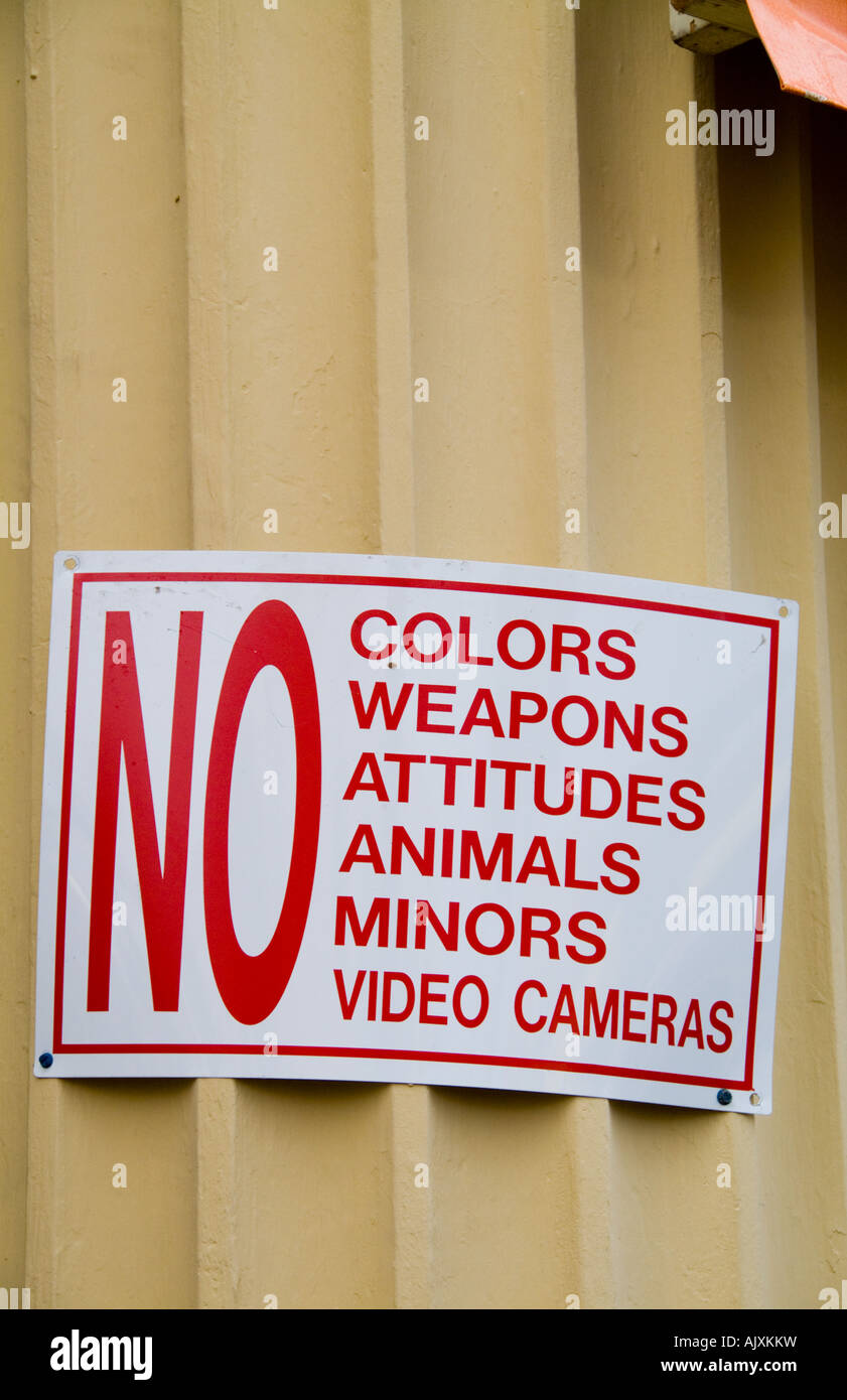 Sign warning of rules of no colors weapons animals attitudes minors ...