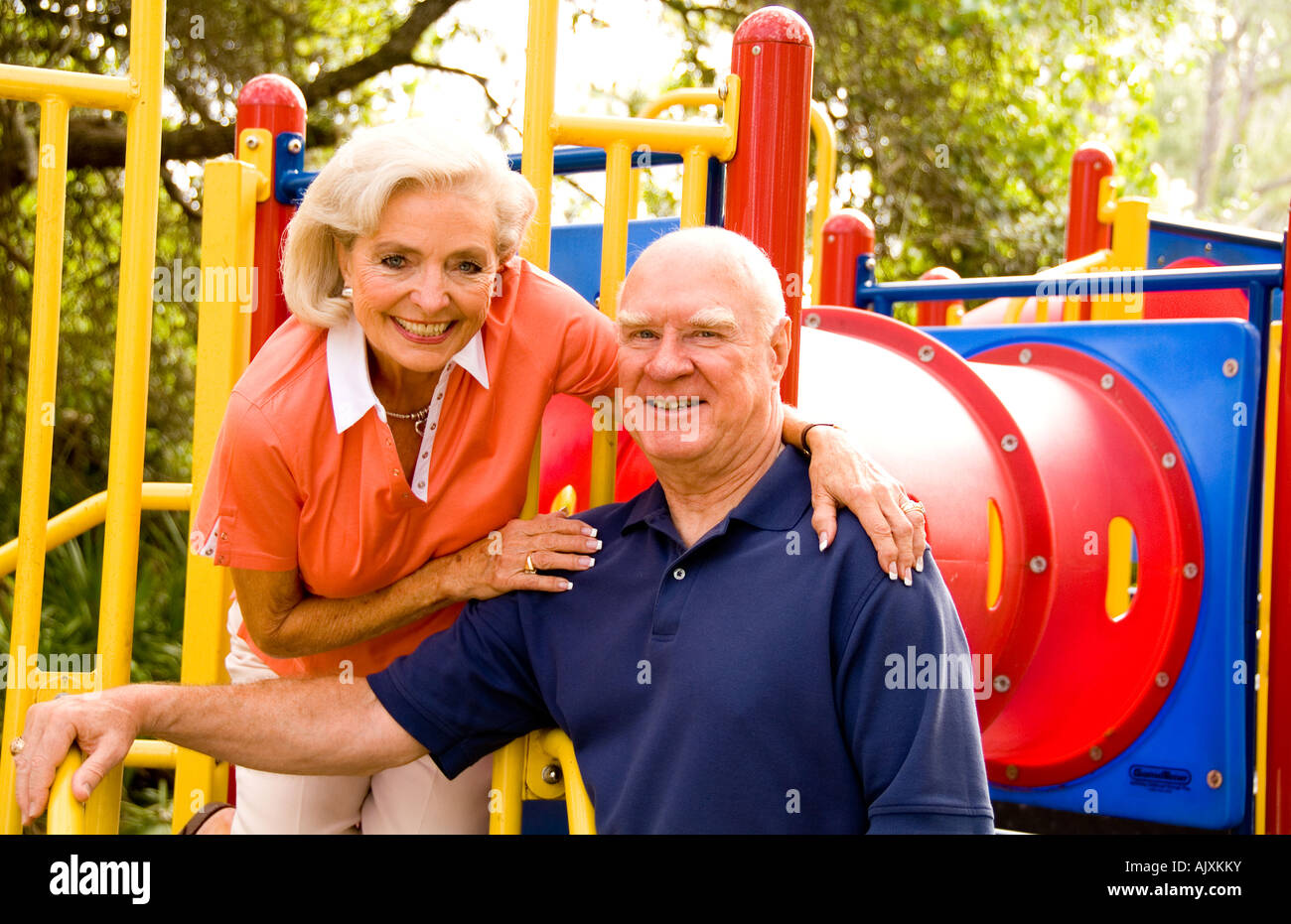 Retired senior couple in love outdoors in playground Stock Photo - Alamy