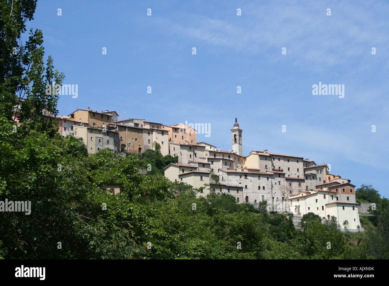 The pretty pastel houses of hilltop village Preci, Umbria, Italy Stock ...