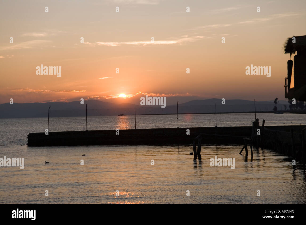 Sunset over Lake Titicaca from the shoreline at the Inca Utama Hotel ...