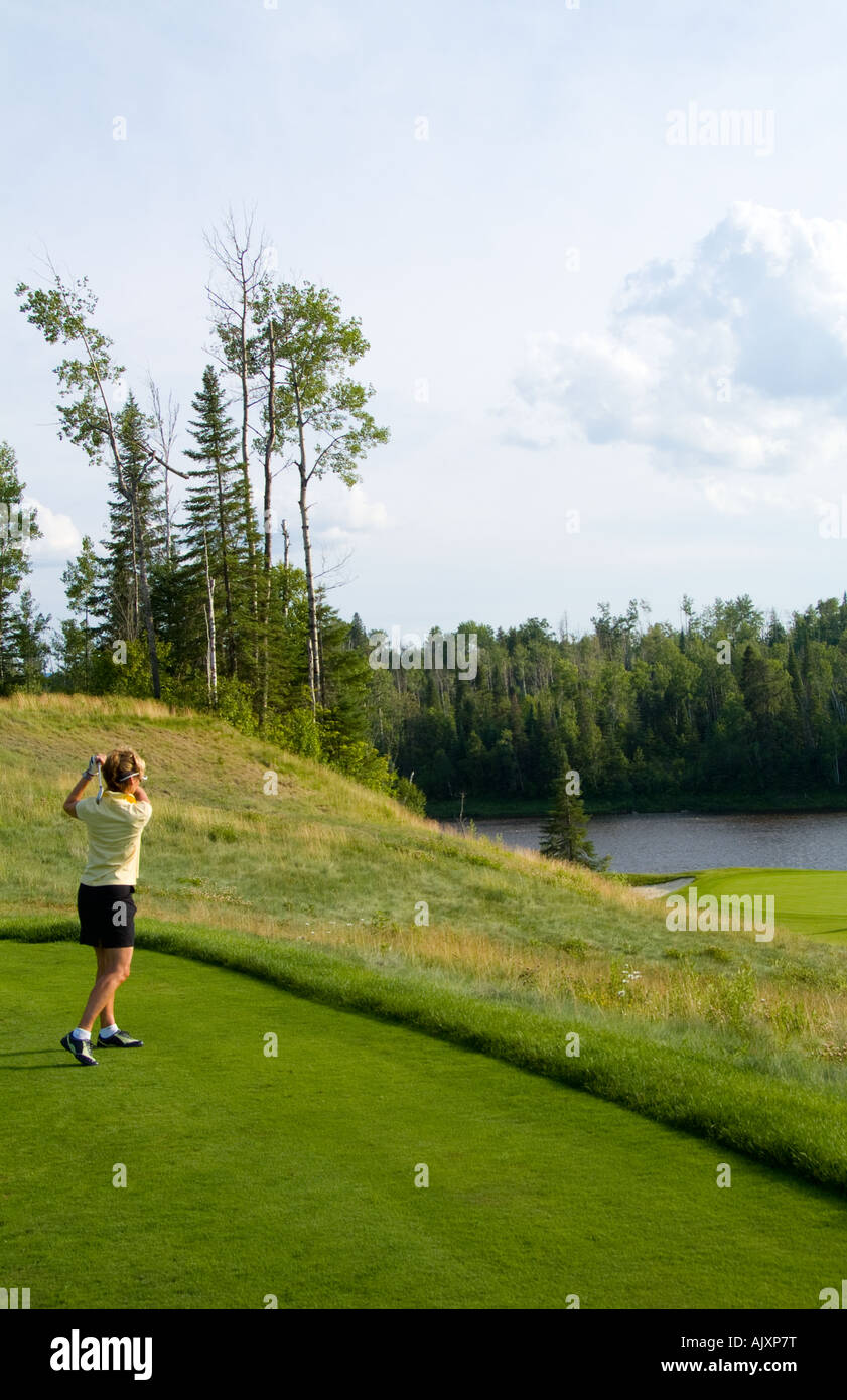 Golfing in Canada woman playing the expensive public Whitewater Golf ...