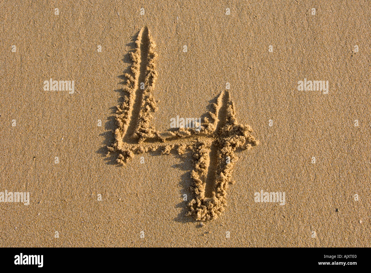 number hand writing numbers on the sand Stock Photo - Alamy
