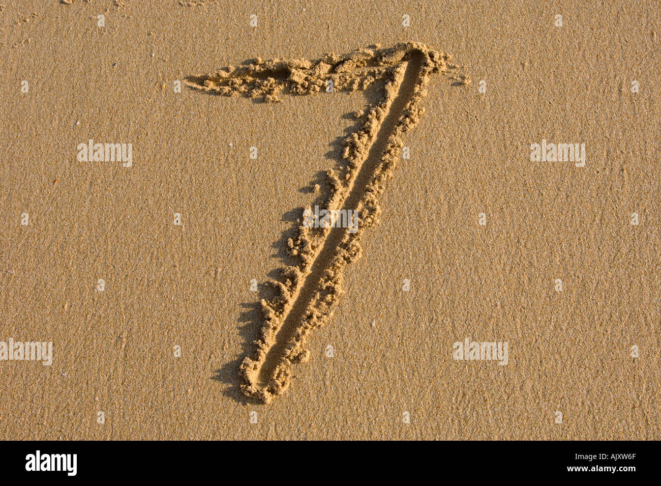 number hand writing numbers on the sand Stock Photo - Alamy