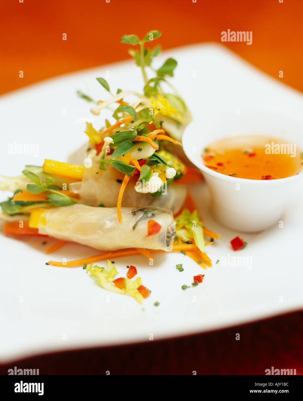 Spring roll and a dip Stock Photo - Alamy