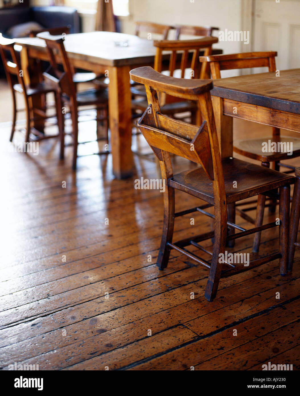 Wooden chairs in a bar Stock Photo - Alamy