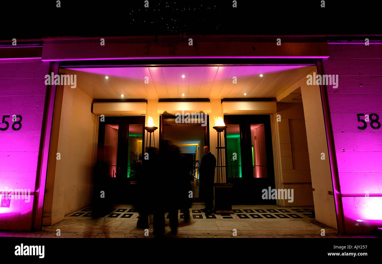 Nightclub doormen and clubbers Stock Photo - Alamy