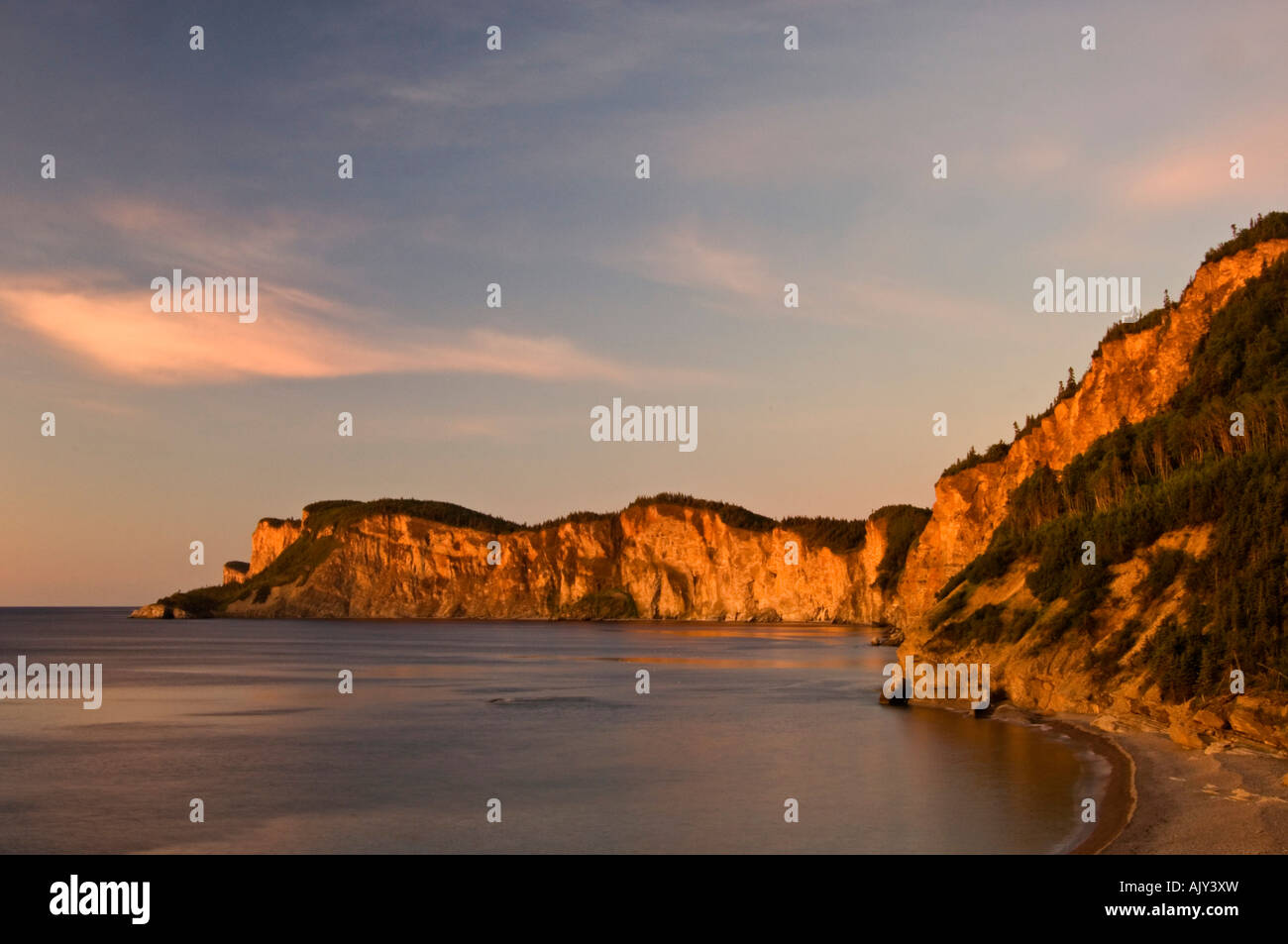 Dawn light on cliffs at Cap-Bon-Ami, Forillon National Park, QC Quebec ...