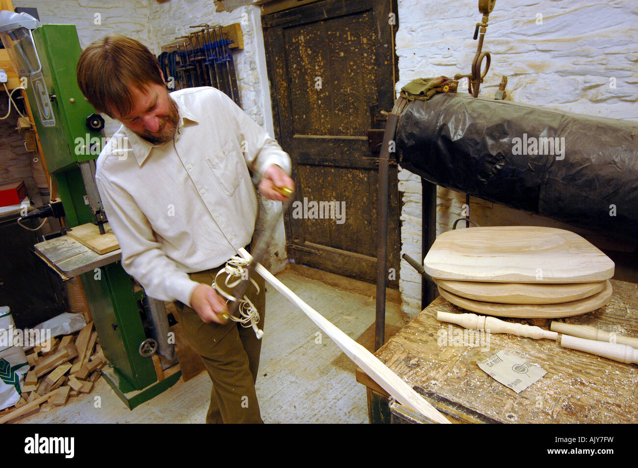 A male woodworker in his workshop, producing chairs Stock Photo - Alamy