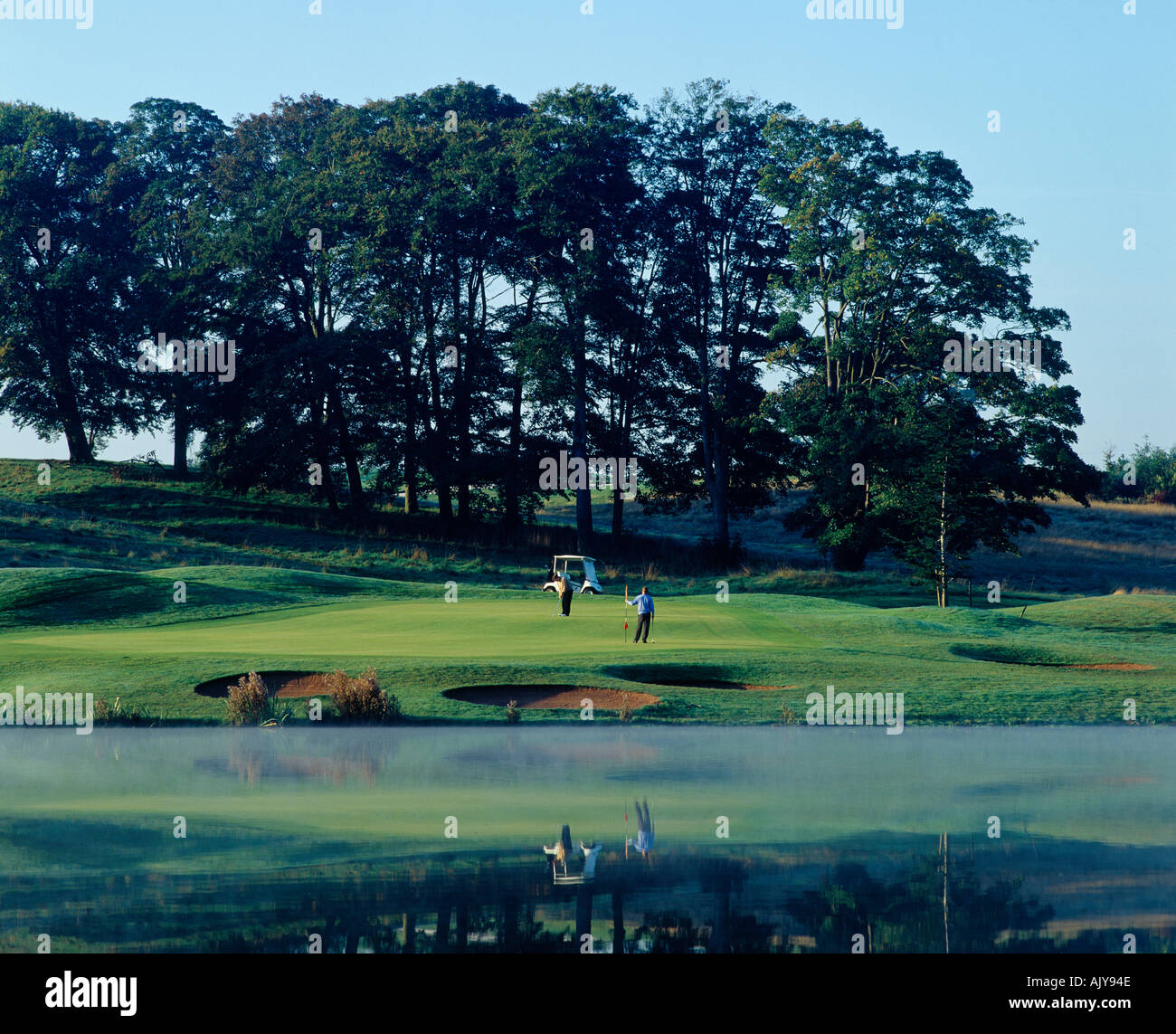 A view of a golf course over a lake Stock Photo - Alamy