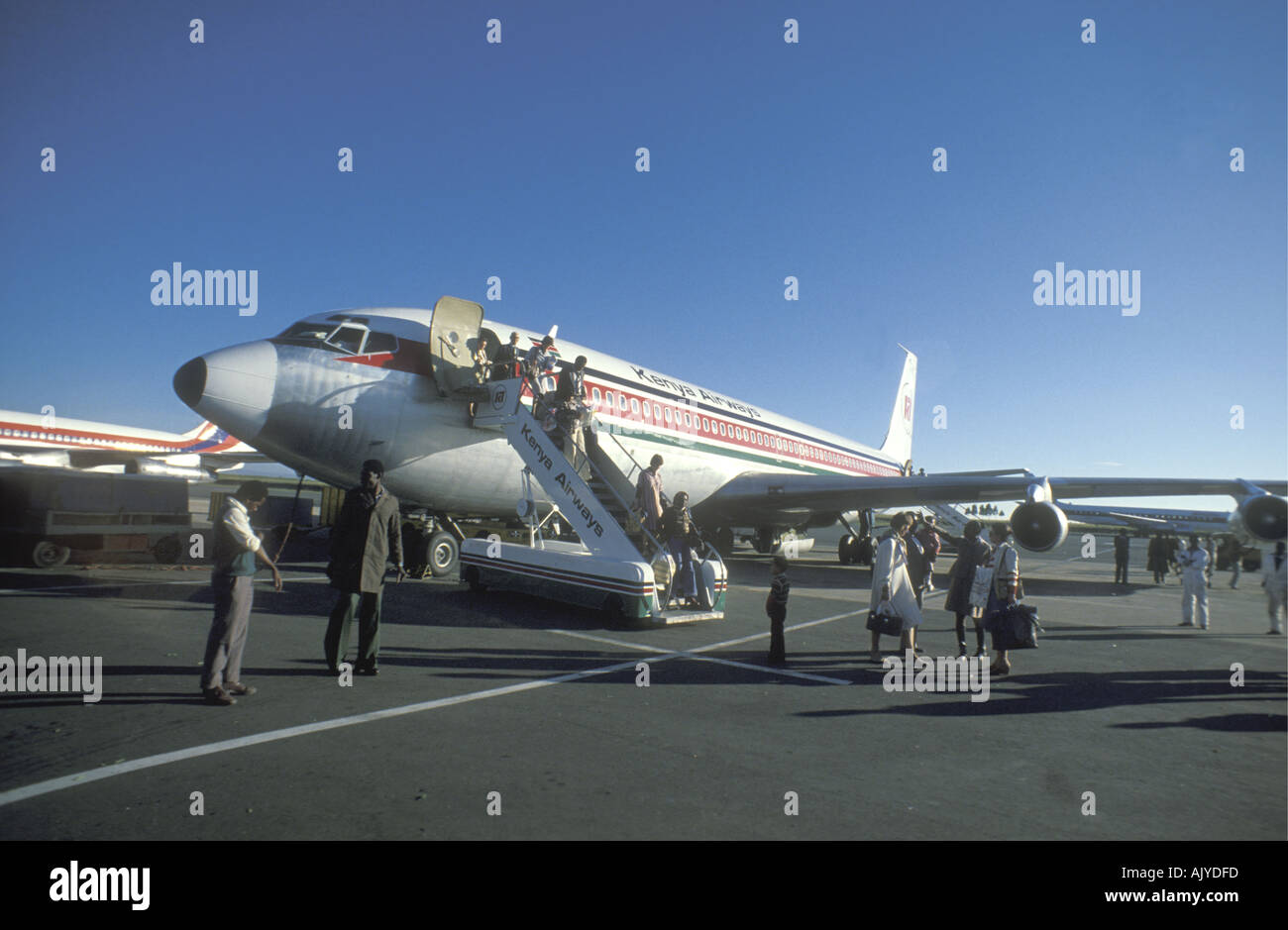 Kenya Airways jet with passengers disembarking on arrival at Jomo ...
