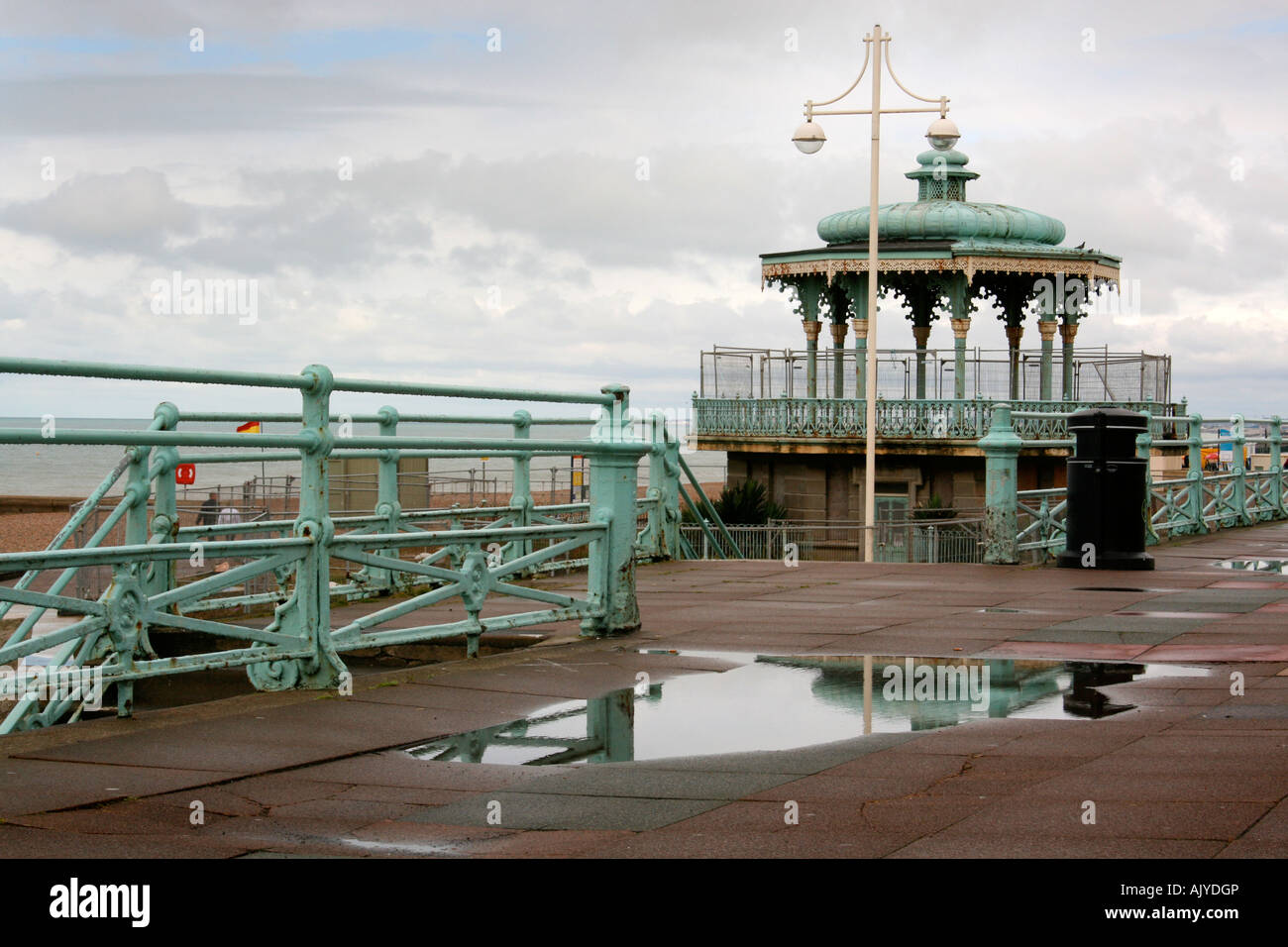 Pavilion reflected in puddle on a wet day in Brighton, England, UK ...