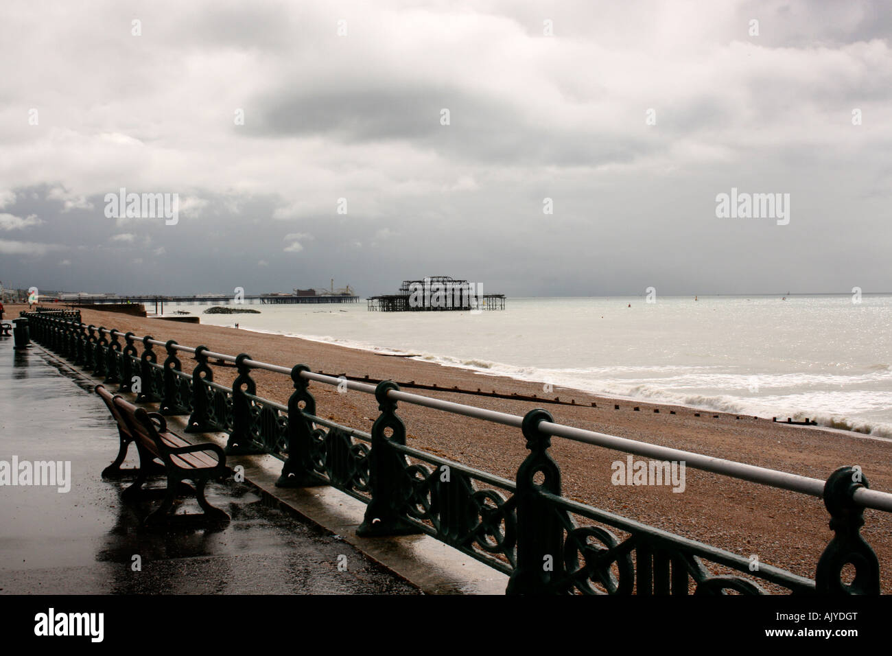 A cold and wet Brighton beach front after rain, with remains of the ...