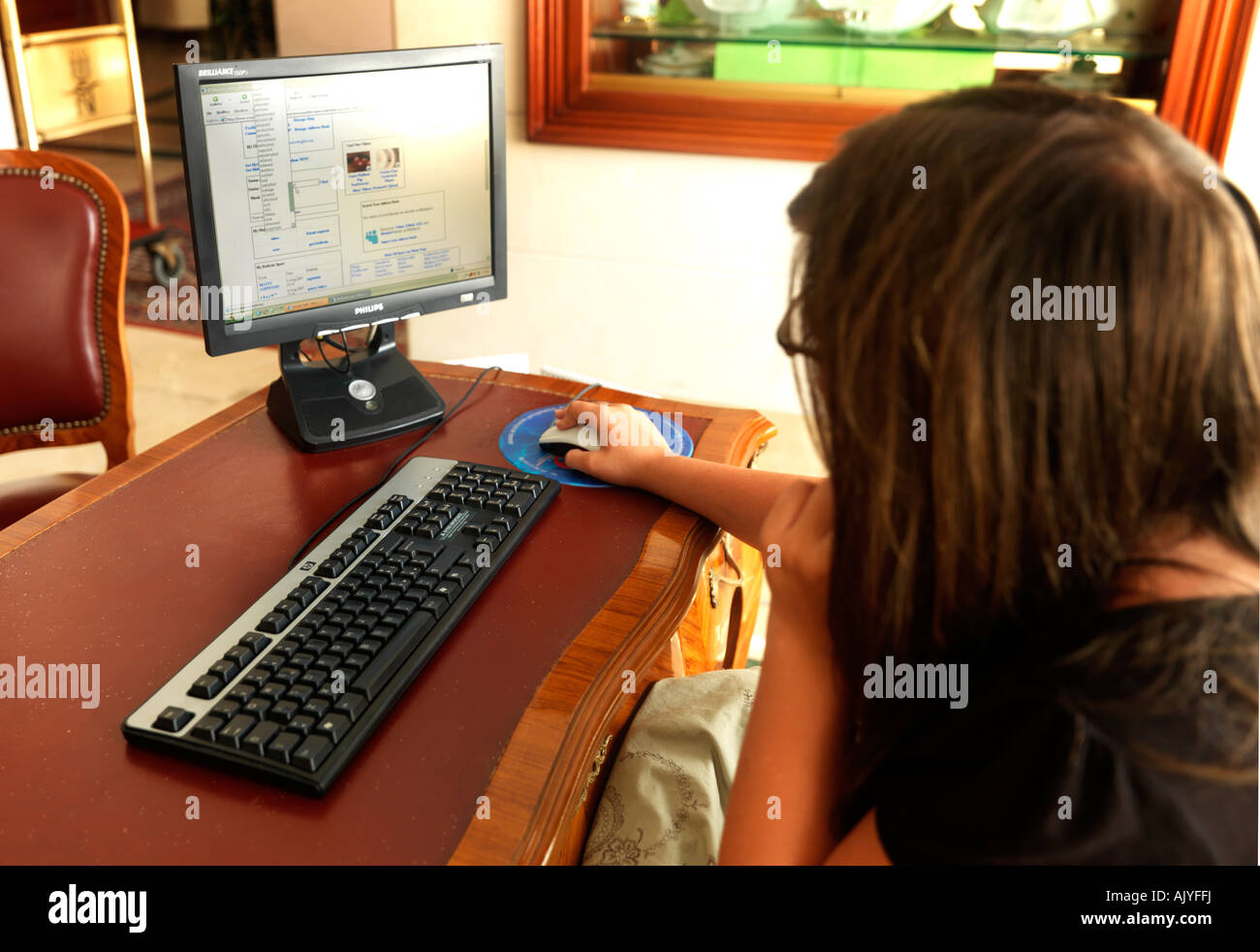 Teenager Using Computer in Hotel Lobby Catania Sicily Stock Photo - Alamy