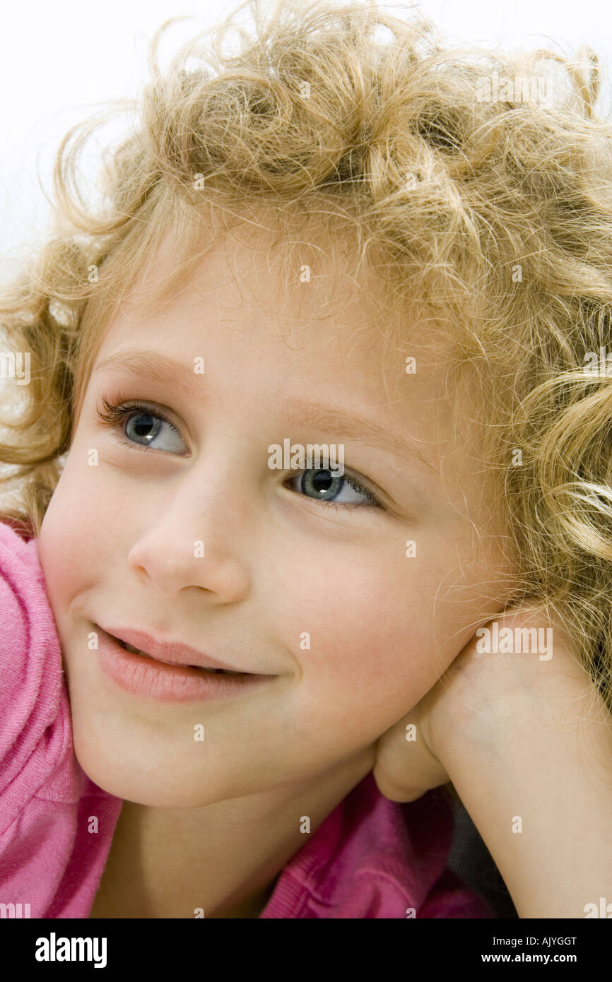 child portrait leaning on hands Stock Photo - Alamy
