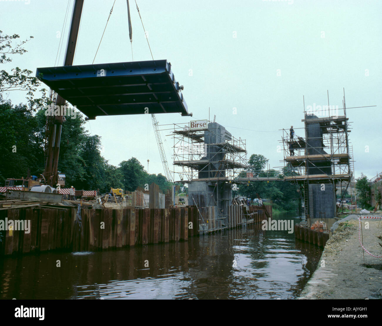 Installation of hinged steel flood barrier gate, River Foss Flood ...