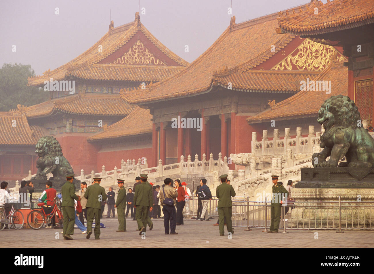 Asia, China, Beijing. Forbidden City, visitors and guards Stock Photo ...