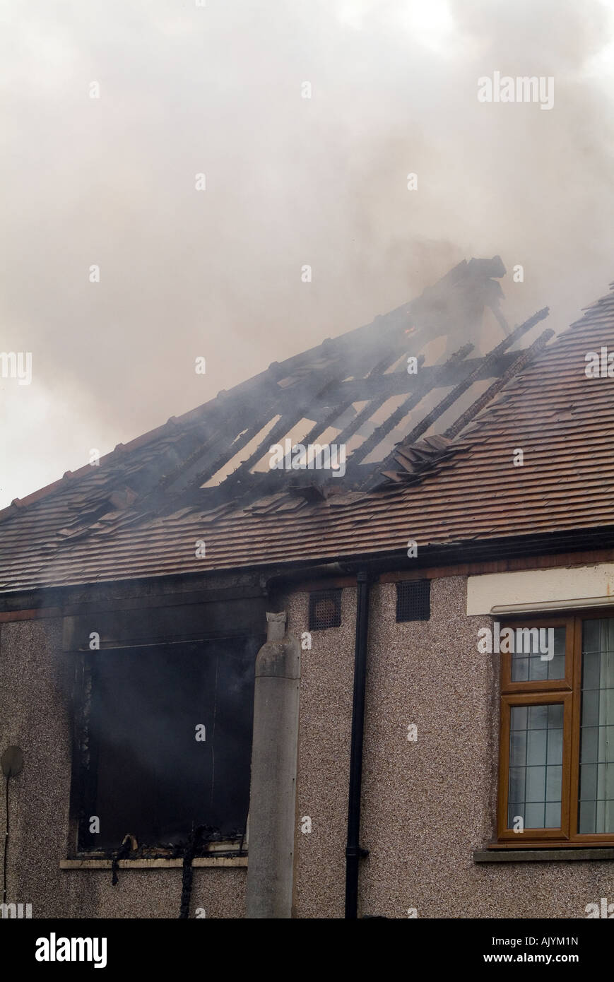 Firefighters attending a house fire in Coventry Stock Photo - Alamy