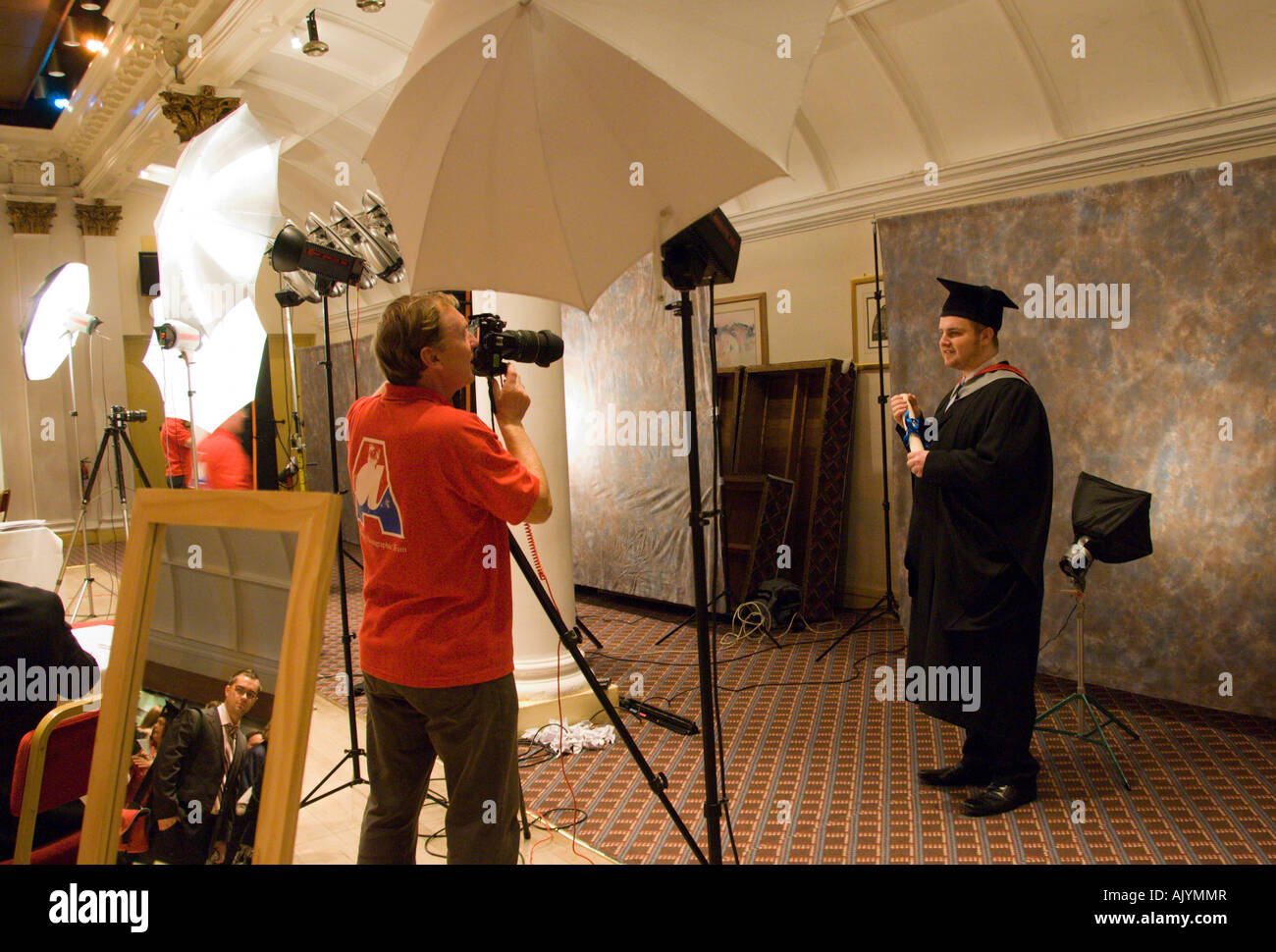Student being photographed during graduation ceremony University of ...