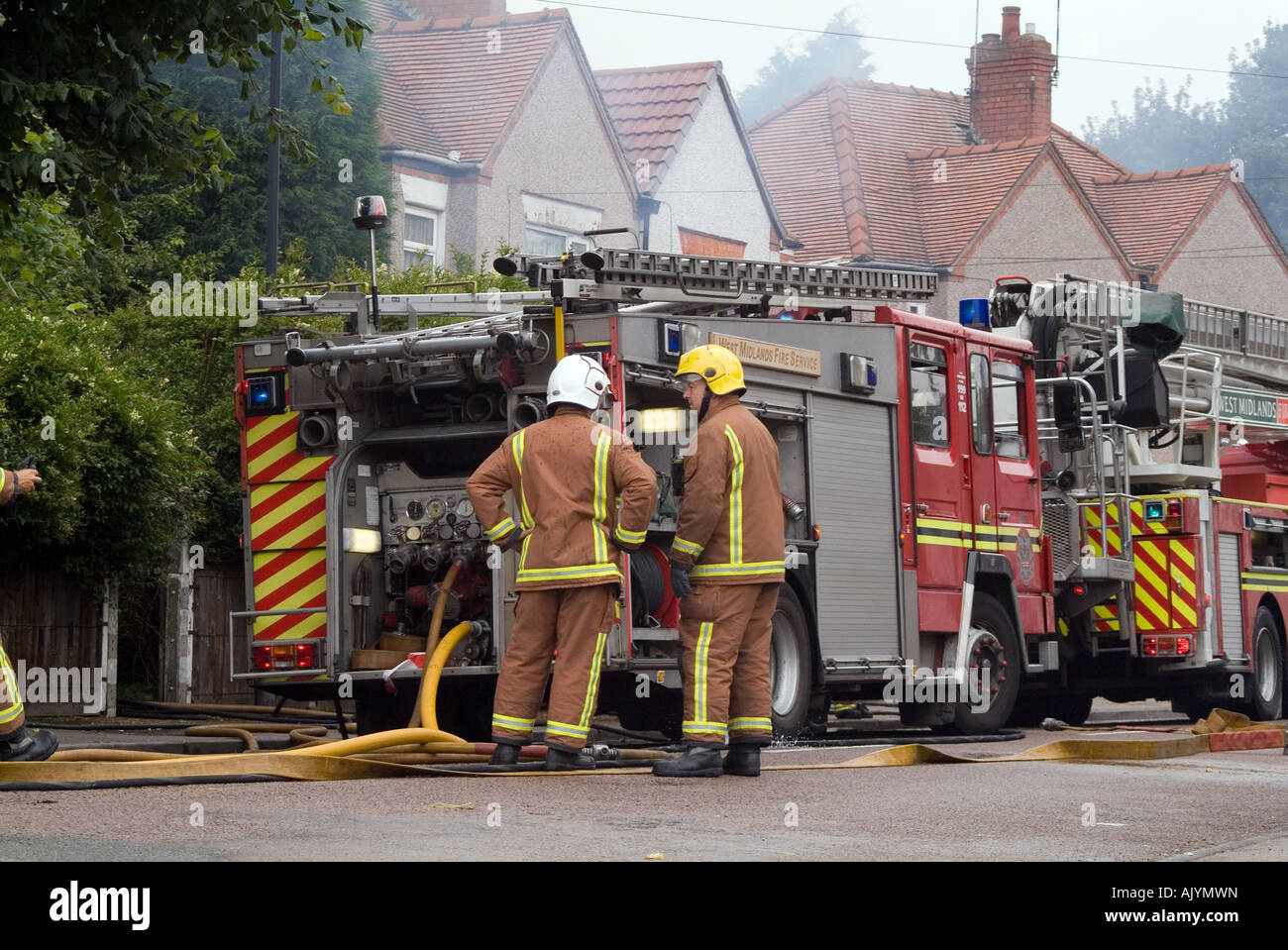 Firefighters attending a house fire in Coventry Stock Photo - Alamy