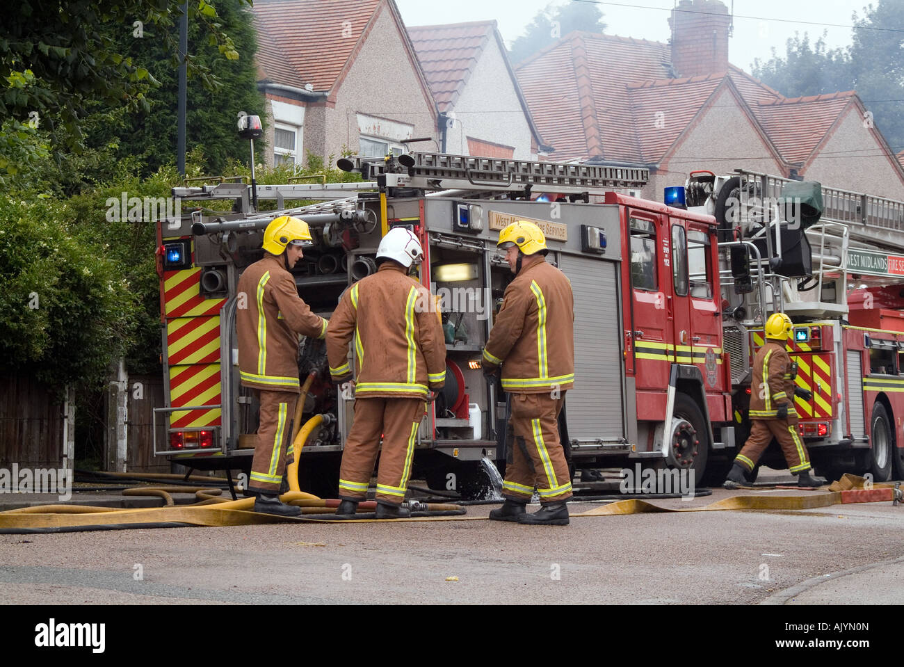 Firefighters attending a house fire in Coventry Stock Photo - Alamy