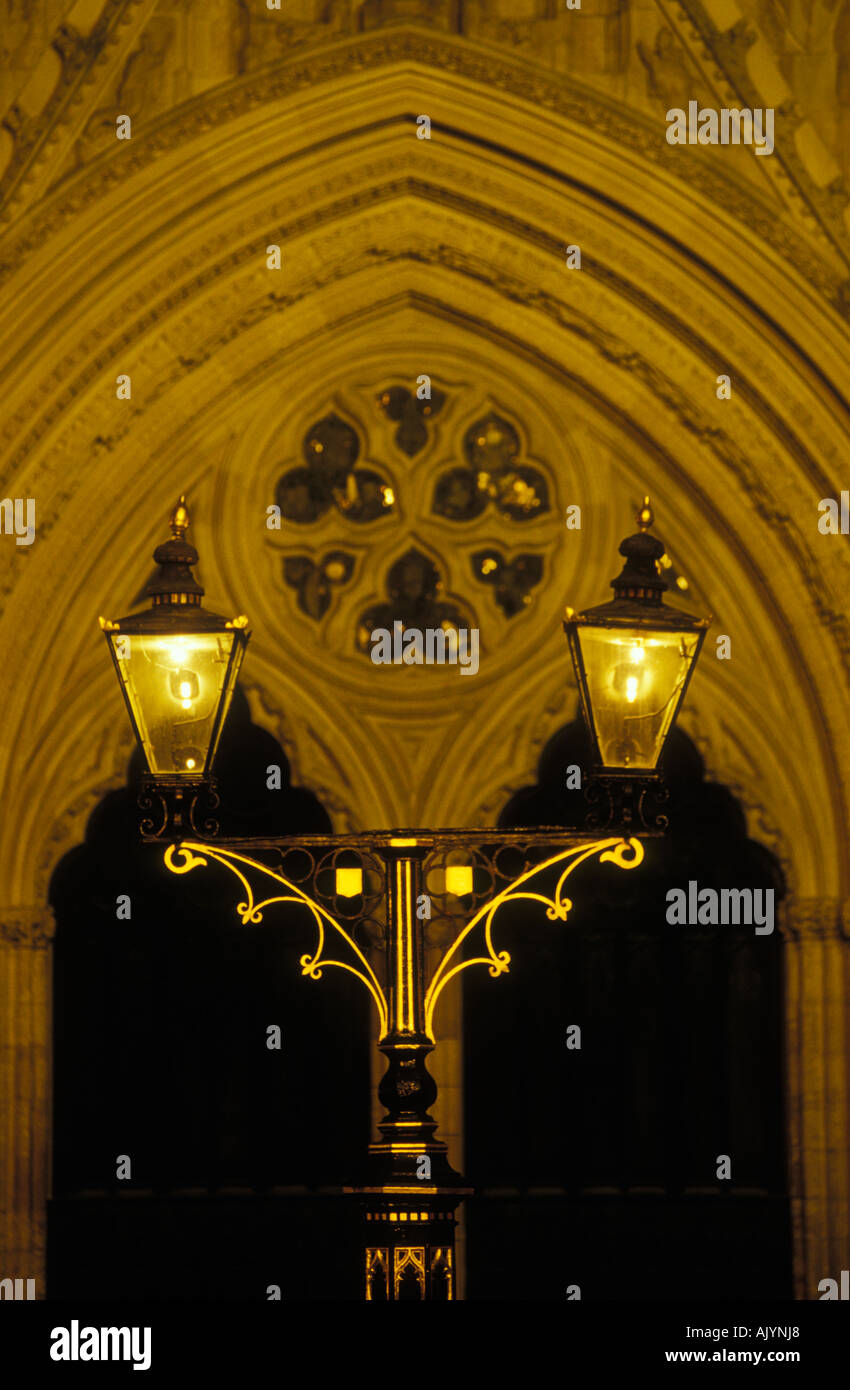 Lamps and an arched window of York Minster at night Stock Photo - Alamy
