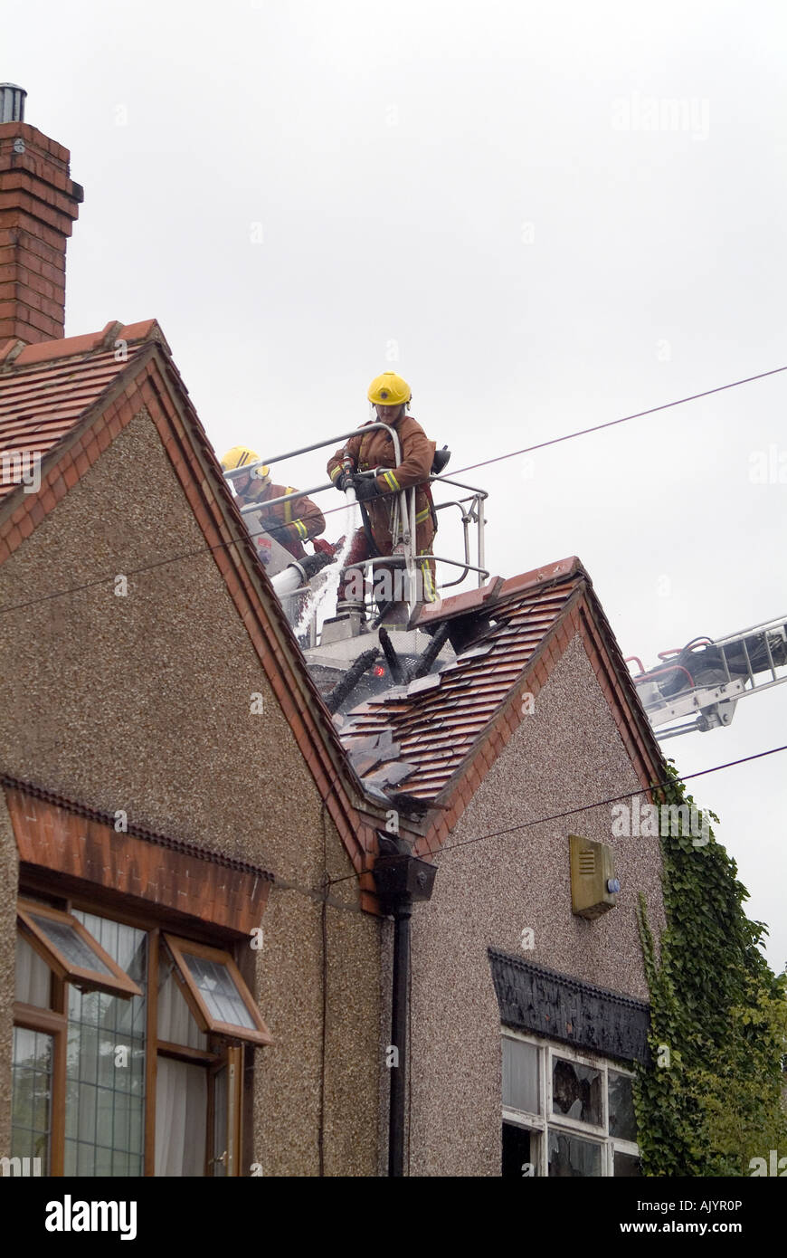 Firefighters attending a house fire in Coventry Stock Photo - Alamy