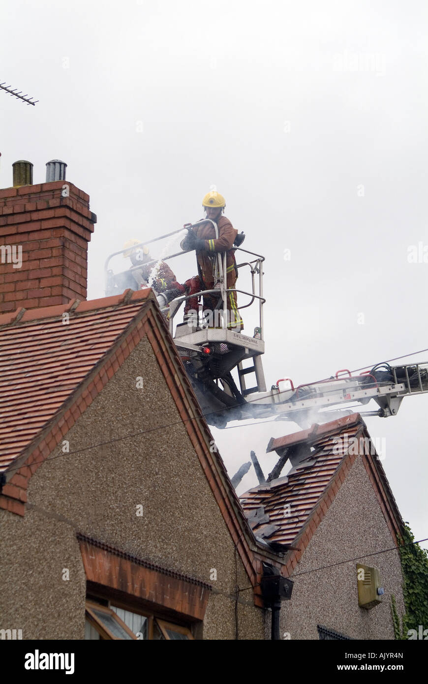 Firefighters attending a house fire in Coventry Stock Photo - Alamy