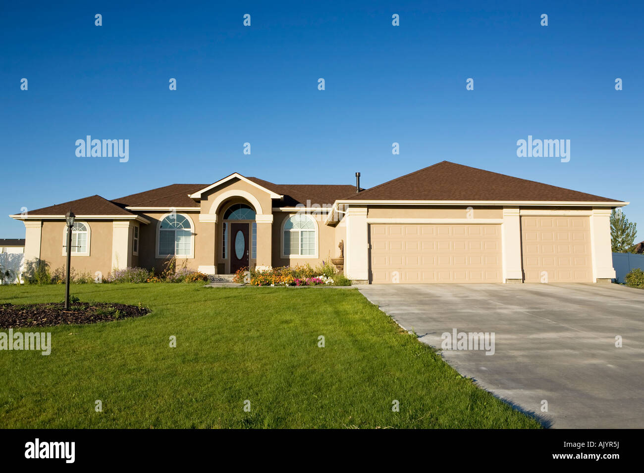 Large modern country home in the summertime Stock Photo - Alamy
