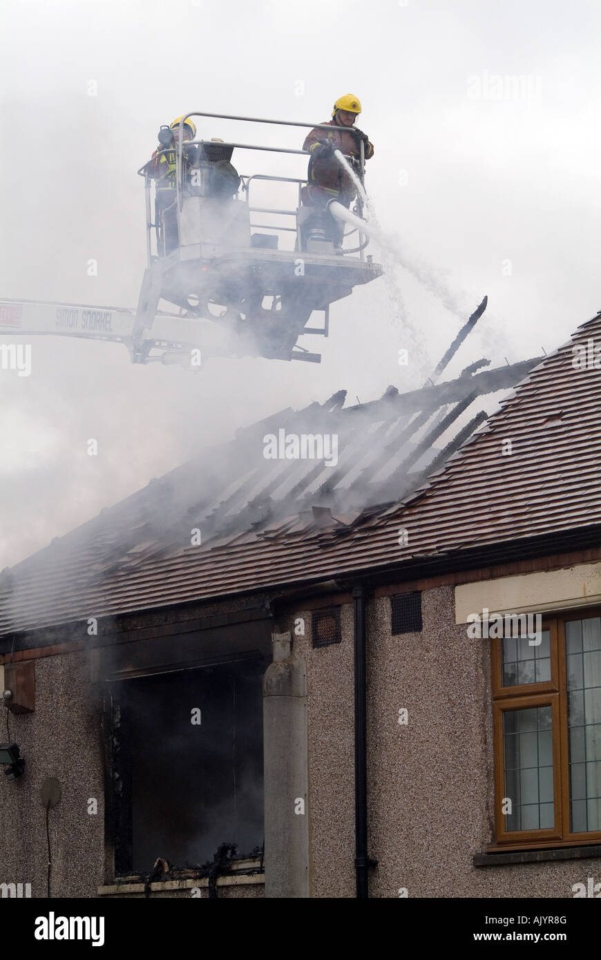 Firefighters attending a house fire in Coventry Stock Photo - Alamy
