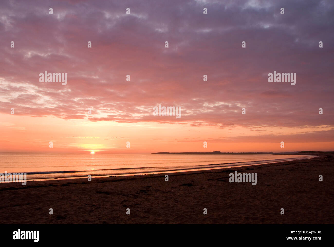 Sunrise over the Gulf of St. Lawrence along Cabot Beach, Malpeque, PE ...