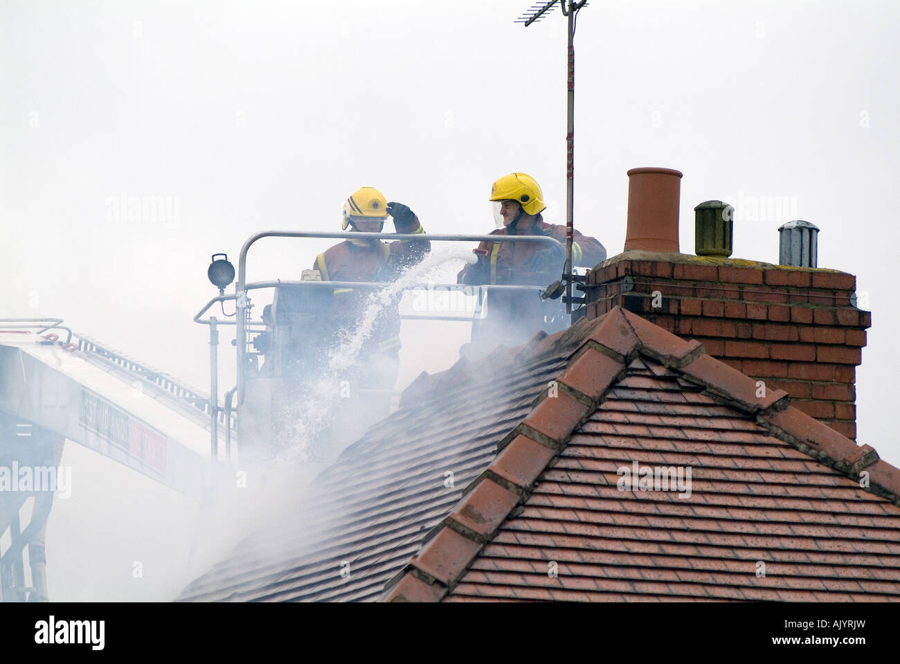 Firefighters attending a house fire in Coventry Stock Photo - Alamy