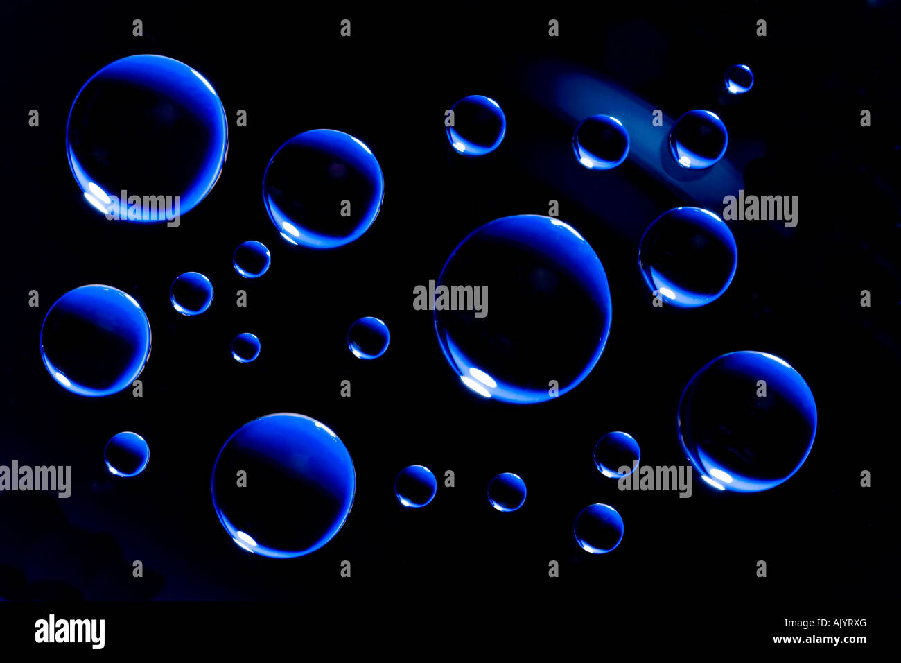 Drops of water. Random drops of water on a blue background Stock Photo ...