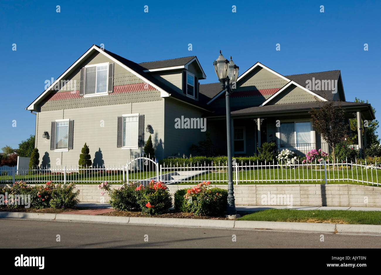 Large modern country home in the summertime Stock Photo - Alamy