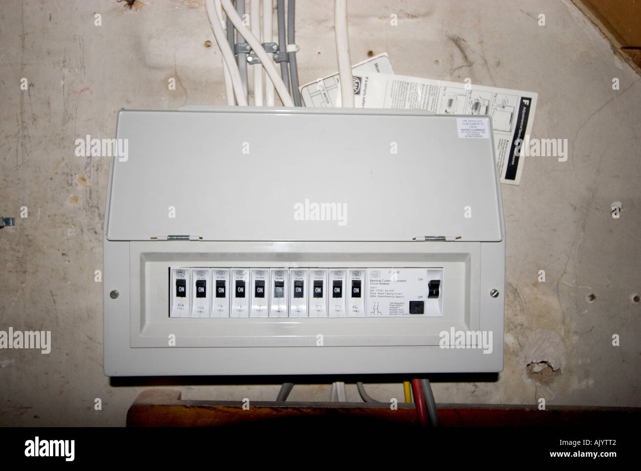 UK circuit breaker electrical fuse box under stairs of house Stock ...