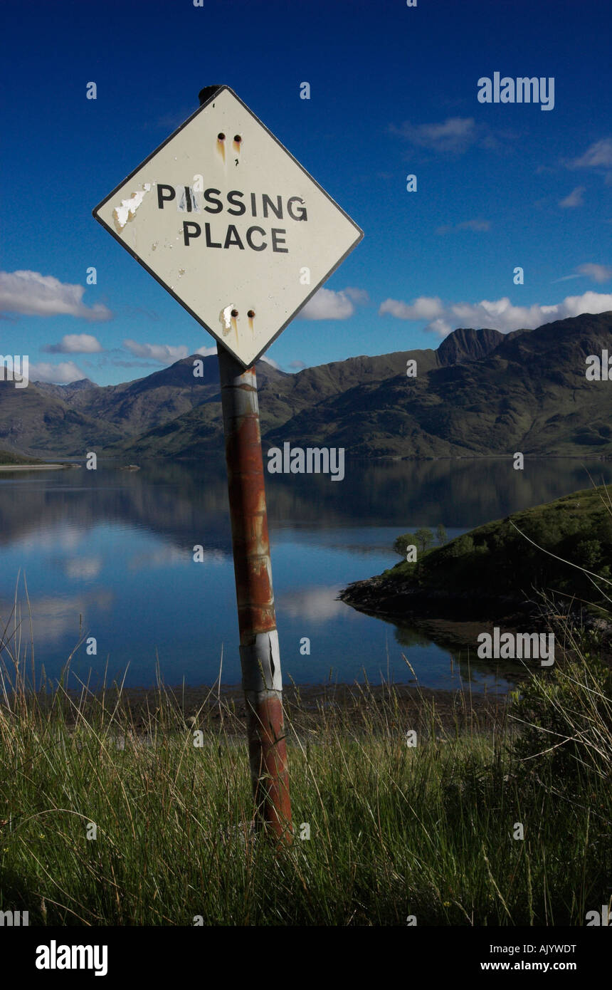 Altered road sign Stock Photo - Alamy