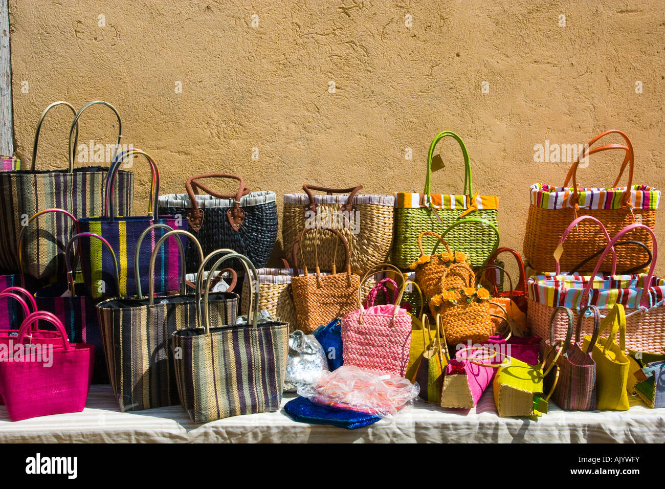 Coloured Handbags for sale Stock Photo - Alamy