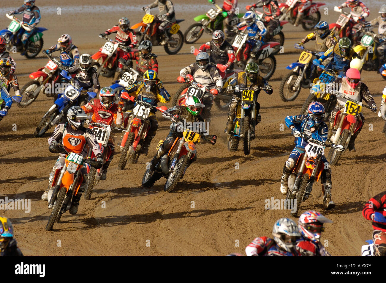 sand-encrusted riders at the Weston Beach Race,Somerset, England. UK ...