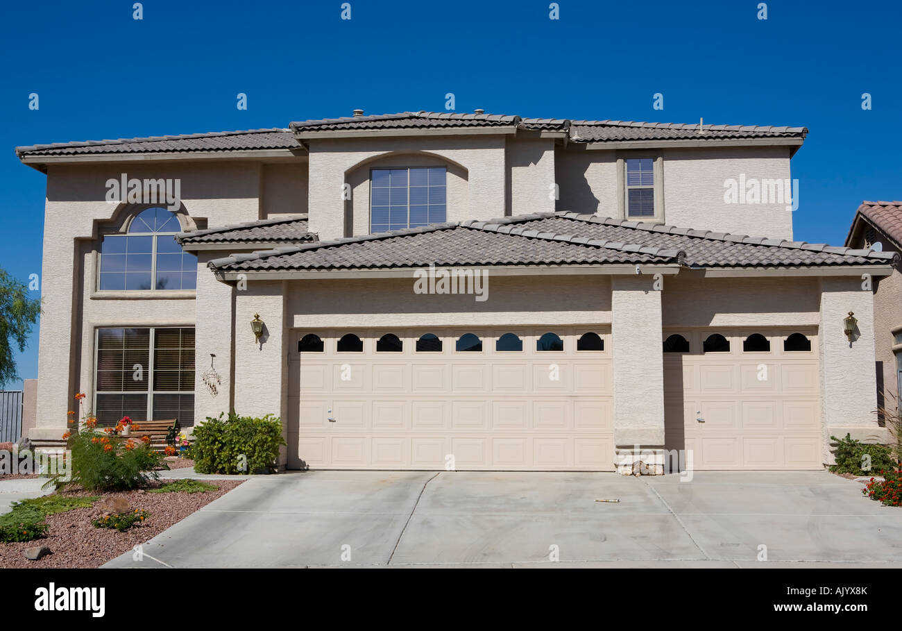 Tan stucco modern home in southwest climate Stock Photo - Alamy