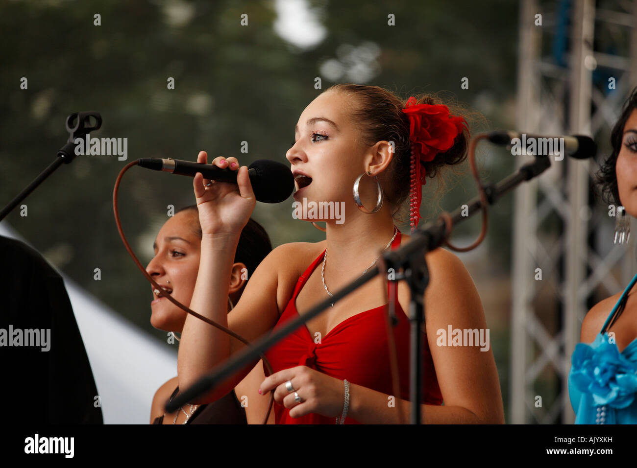 young romany gypsy singer in performance in summer festival in ...