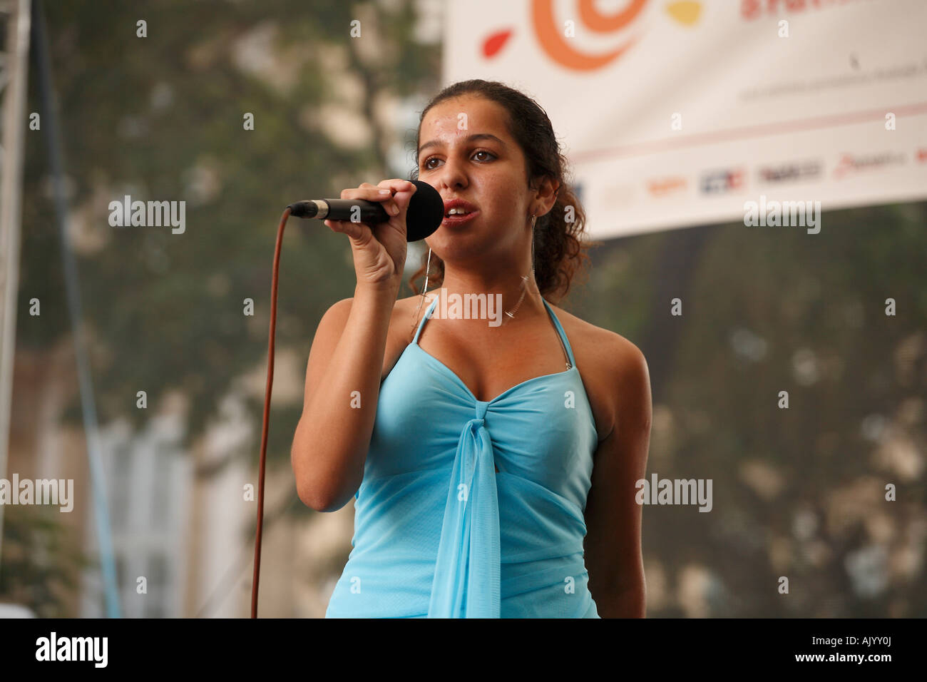 young romany gypsy singer in performance in summer festival in ...
