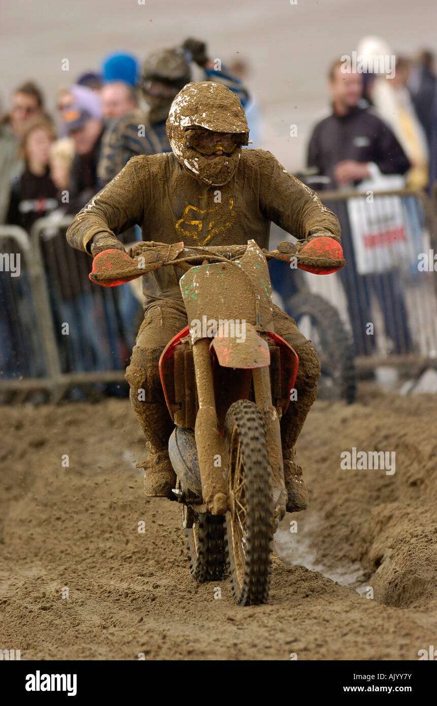 A sand-encrusted rider at the Weston Beach Race, Somerset, England. UK ...