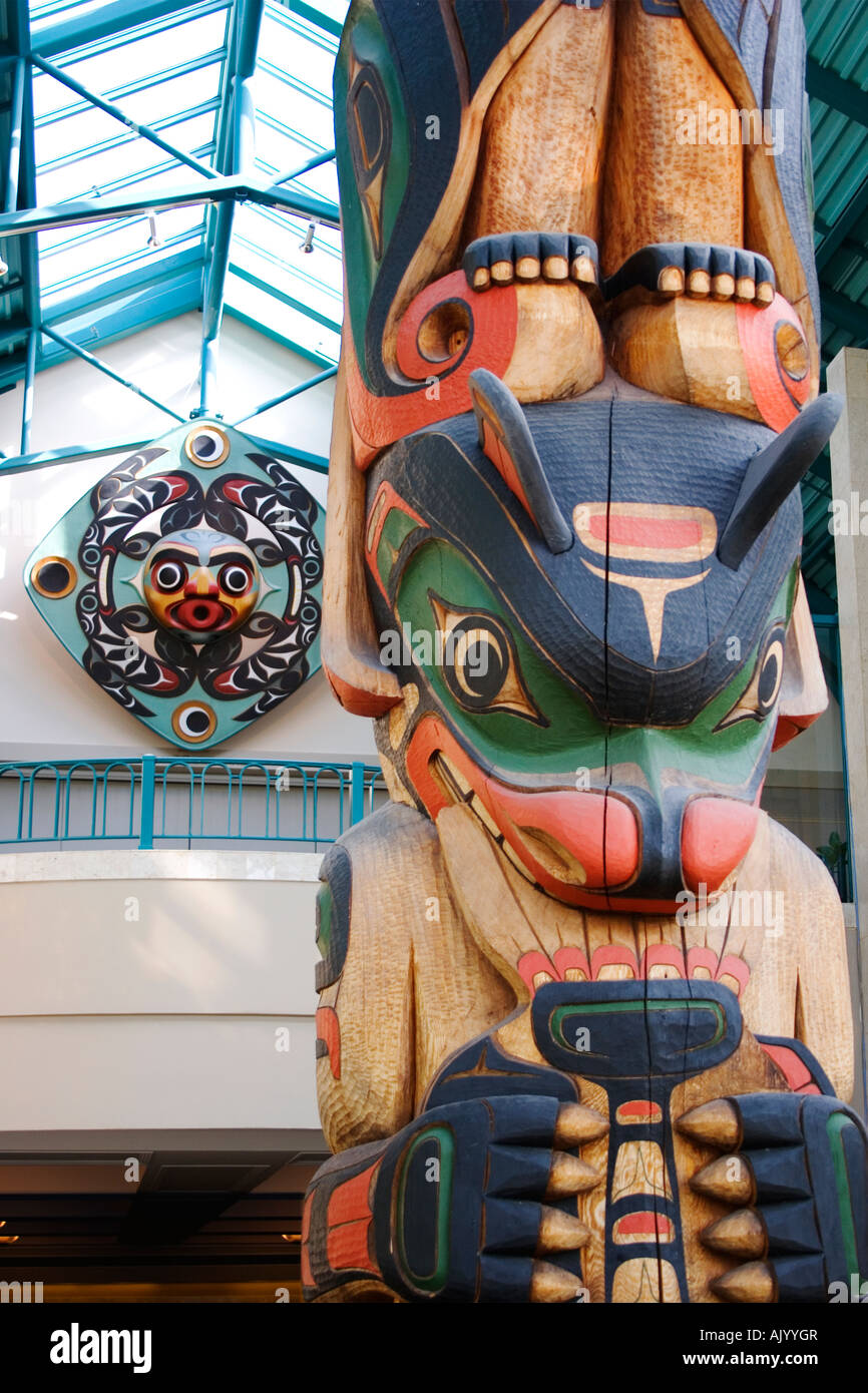 Closeup of totems inside the Victoria Conference Center Stock Photo - Alamy
