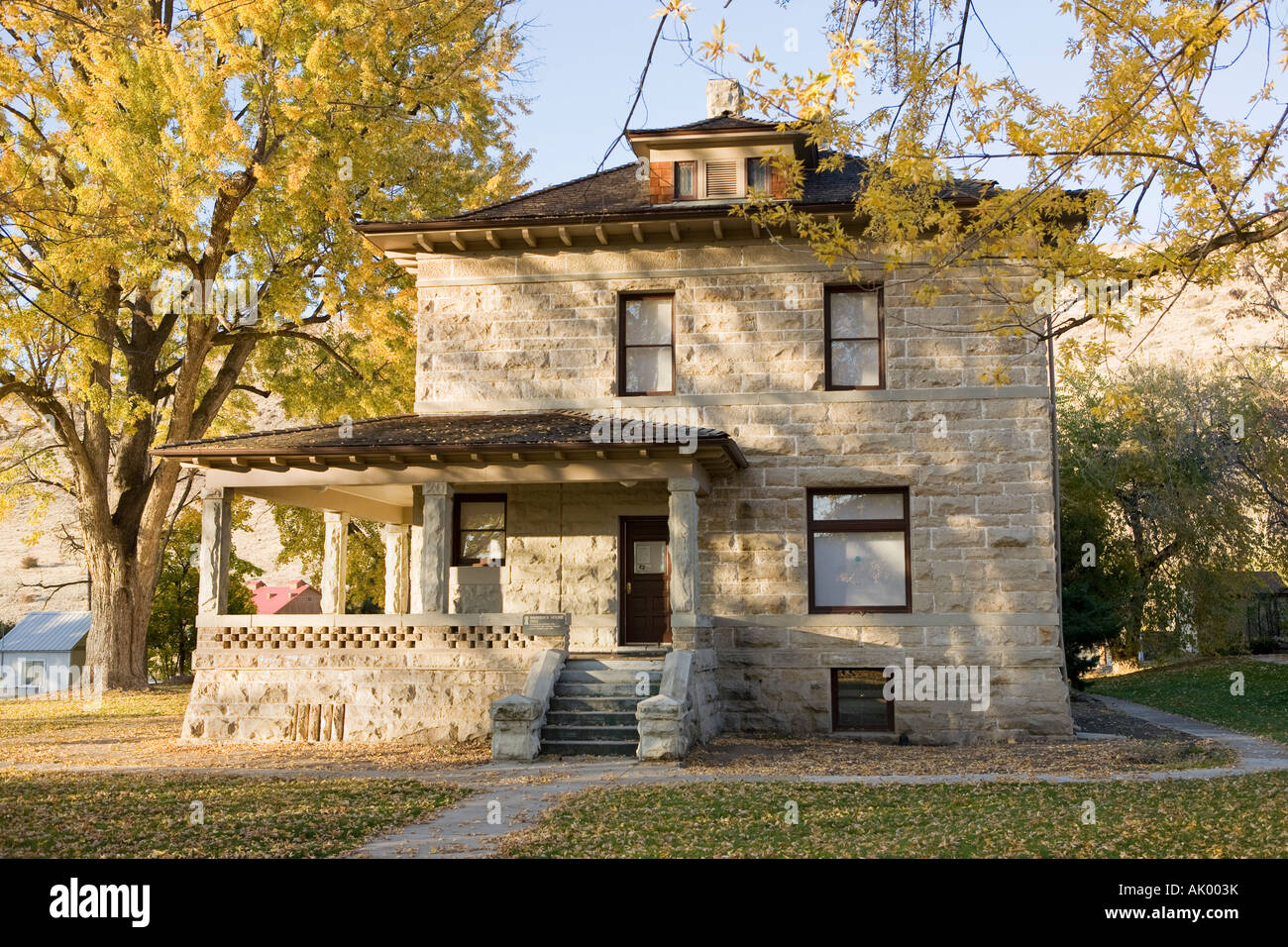 Large three story vintage house in the Fall Stock Photo - Alamy