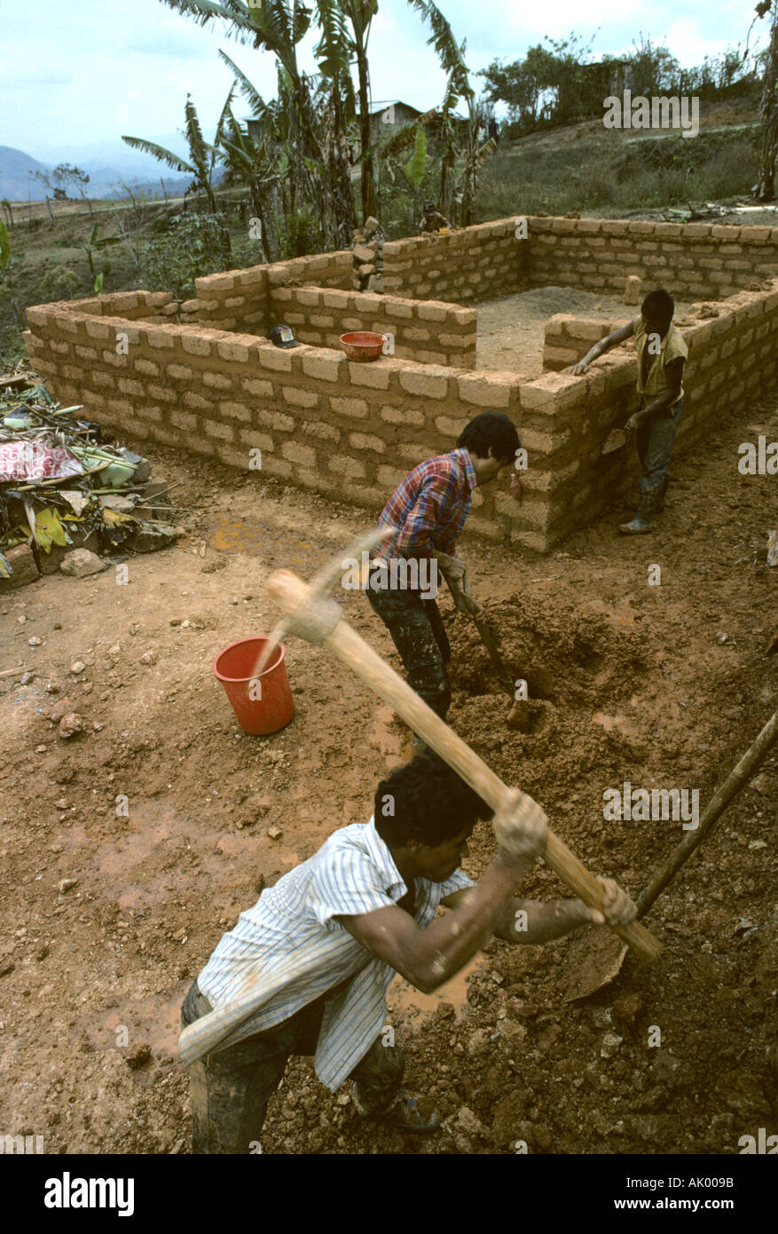 Building a house in Nicaragua from compressed mud bricks Stock Photo ...