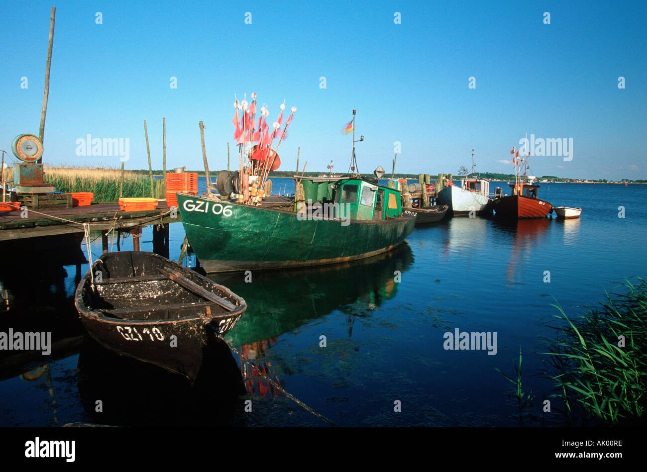 Fishing boats in harbour Stock Photo - Alamy