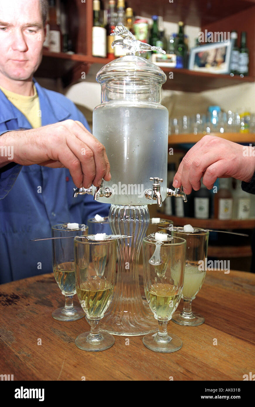 Pouring Absinthe at the Distillery Guy de Pontarlier in the French ...