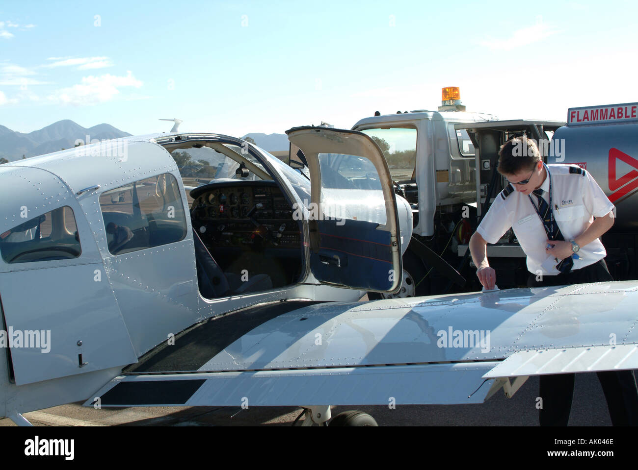 Trainee Pilot Undertaking Pre Flight Check at Scottsdale Airport ...