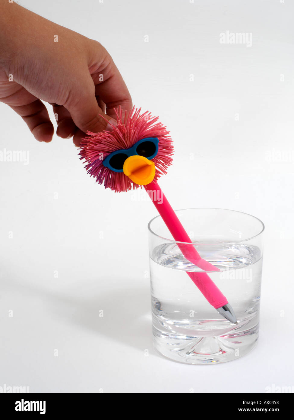 Refraction Pen Refracting in a Glass of Water Stock Photo - Alamy
